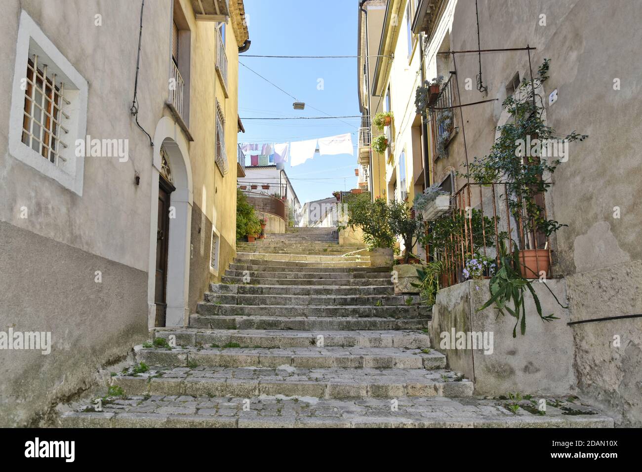 A narrow street among the old houses of Riccia, a medieval village in ...
