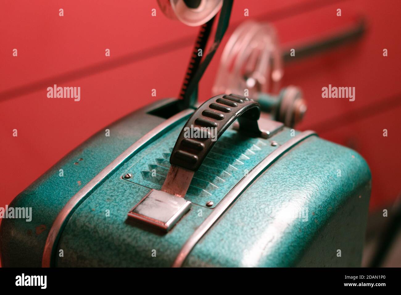 Old 8mm Film Projector over pink blured background. Retro style 60's ...