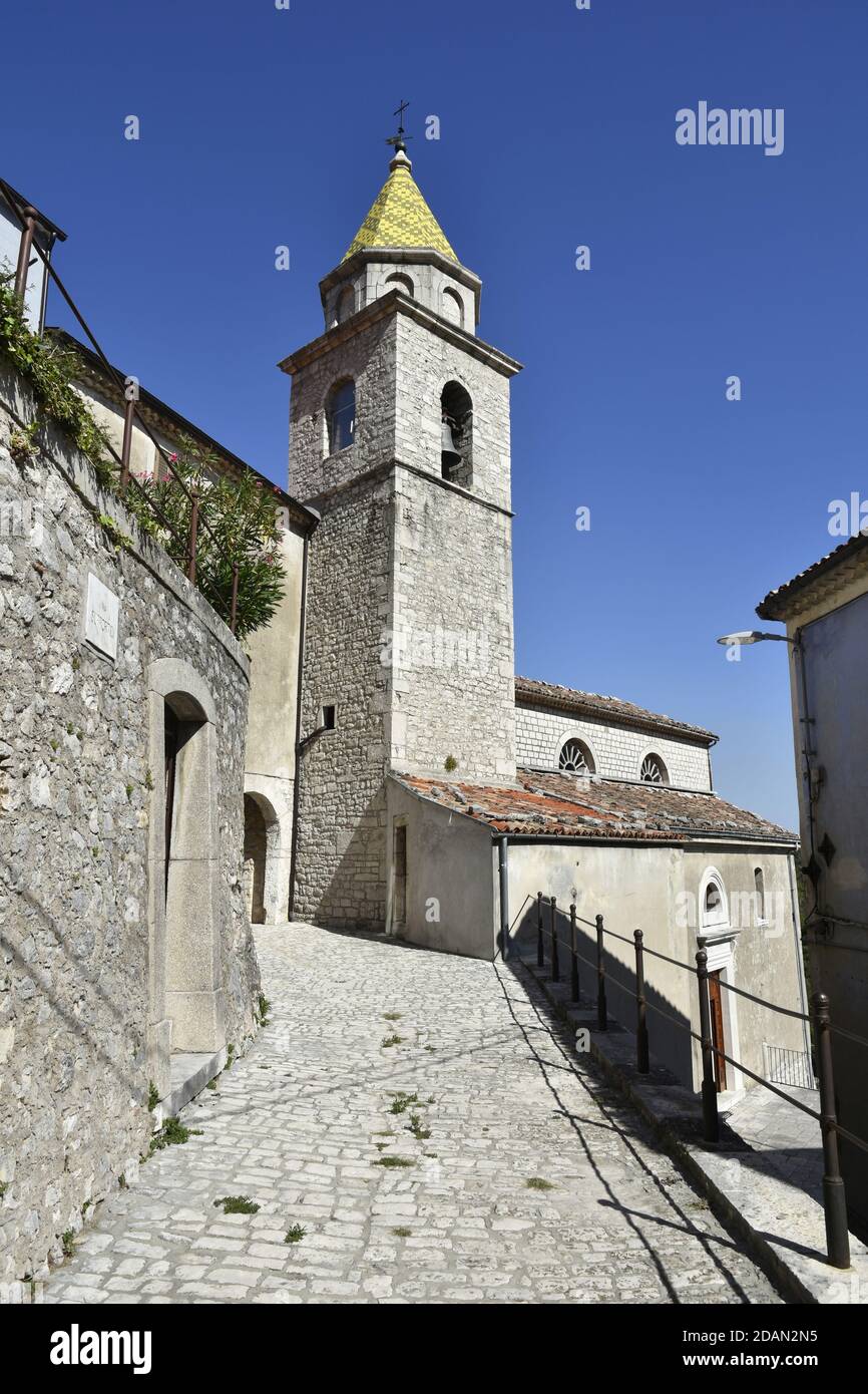 A narrow street among the old houses of Sepino, a medieval village in ...