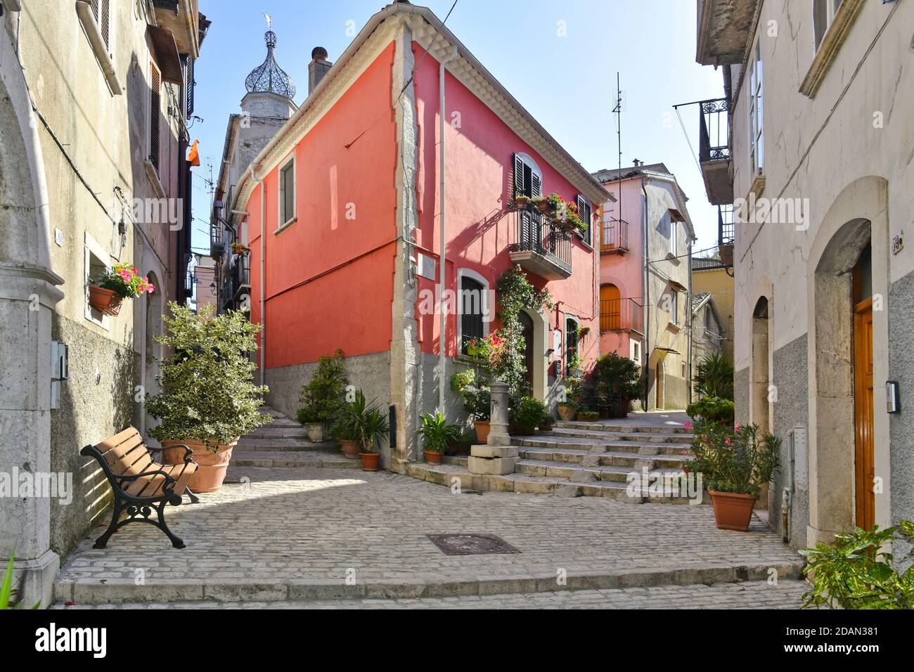 A narrow street among the old houses of Sepino, a medieval village in ...