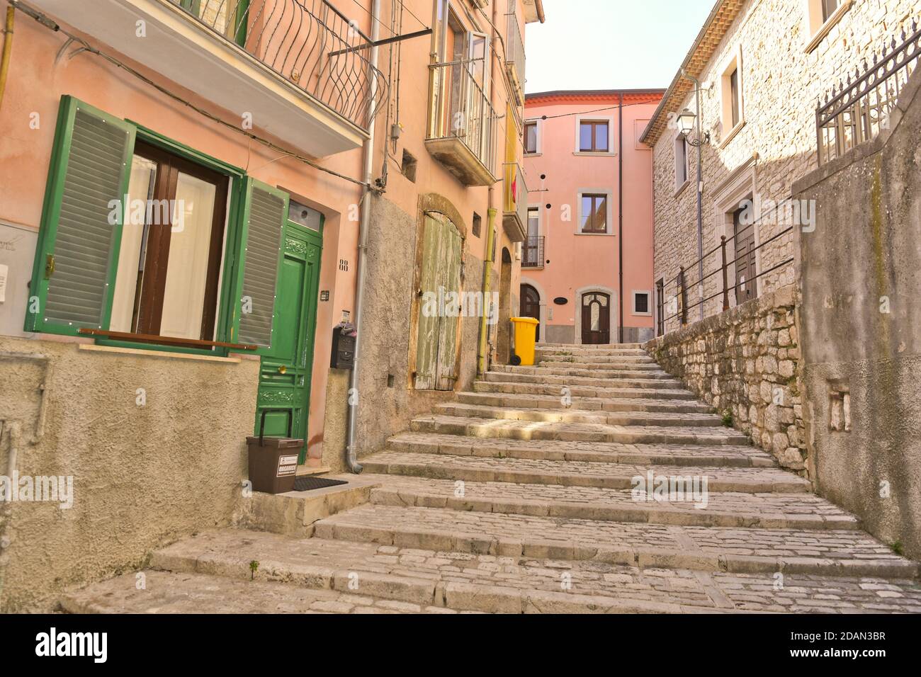 A narrow street among the old houses of Sepino, a medieval village in ...