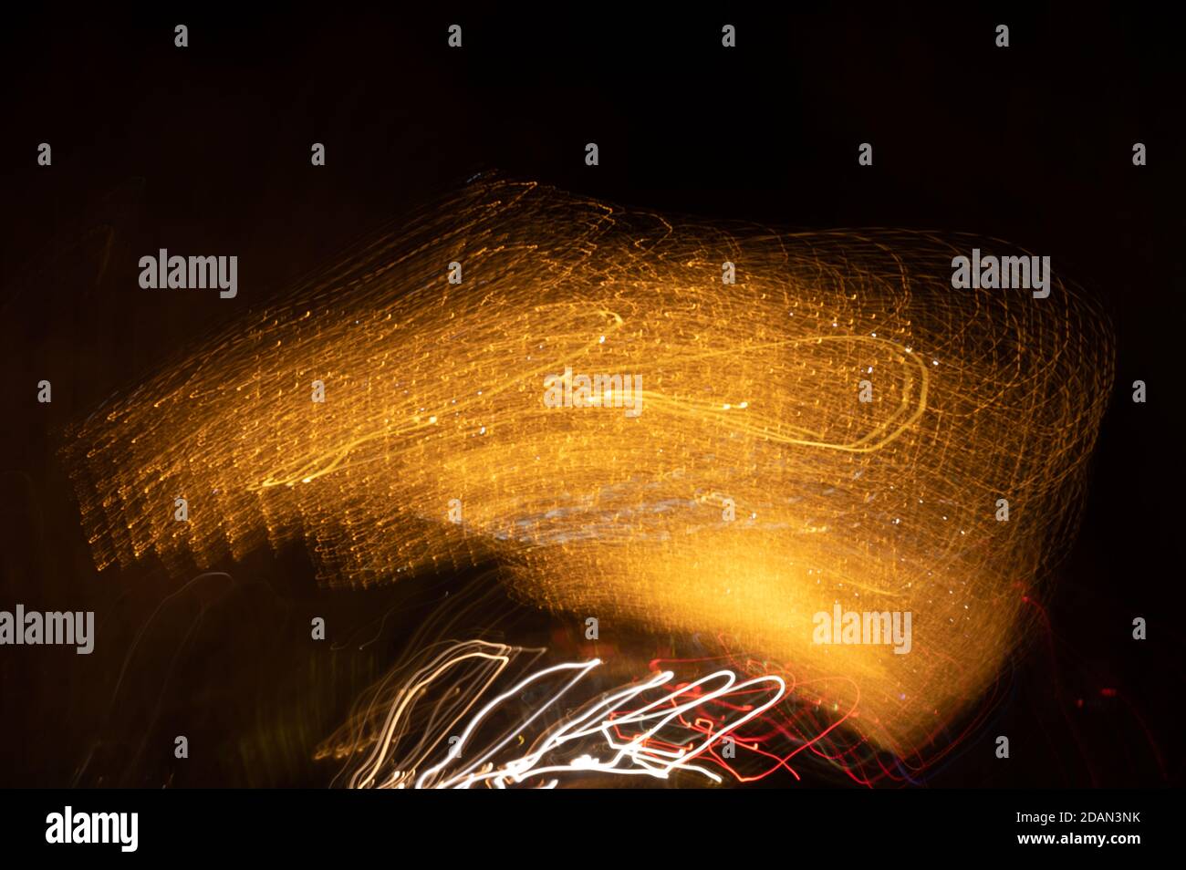 Speed of digital lights in motion. Bright orange neon glowing fast ...
