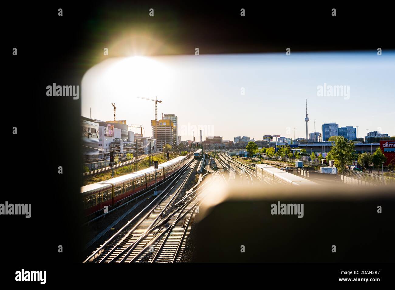 railway view with train passing by Stock Photo - Alamy