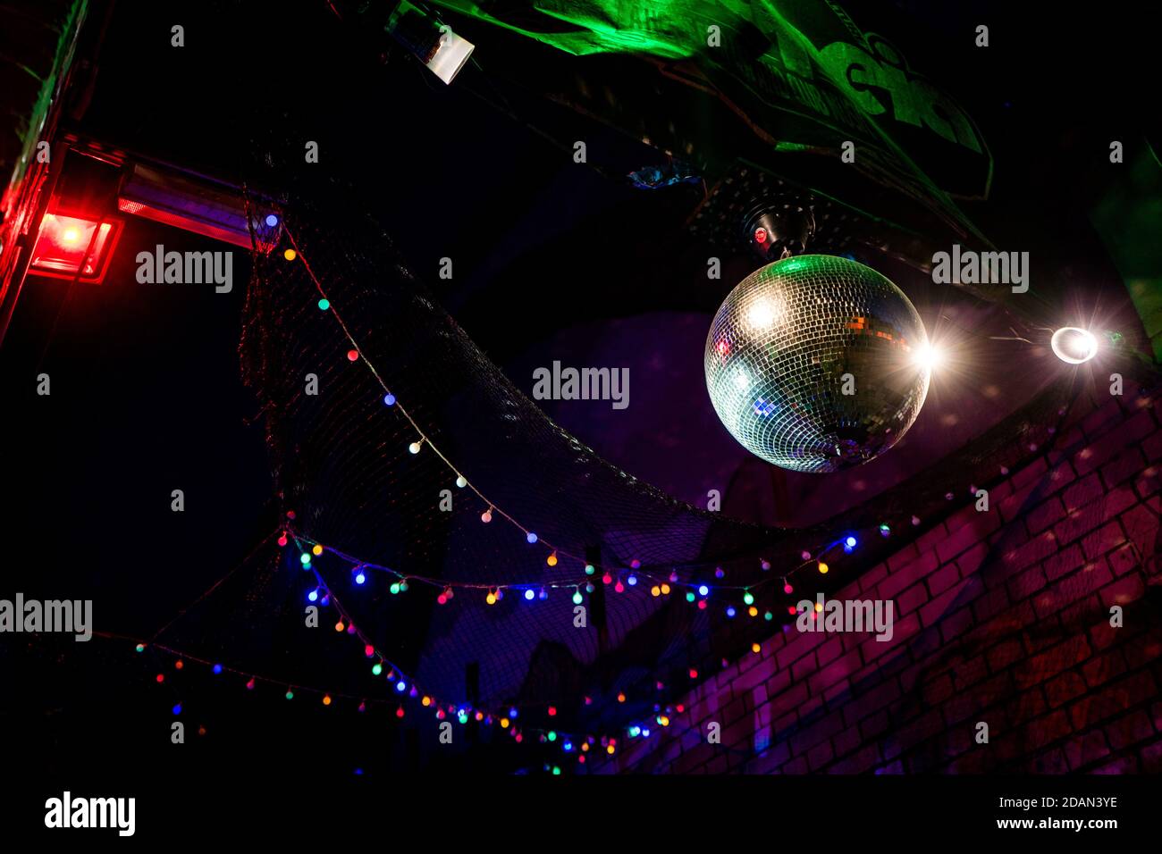 mirror ball reflecting light in a club Stock Photo - Alamy