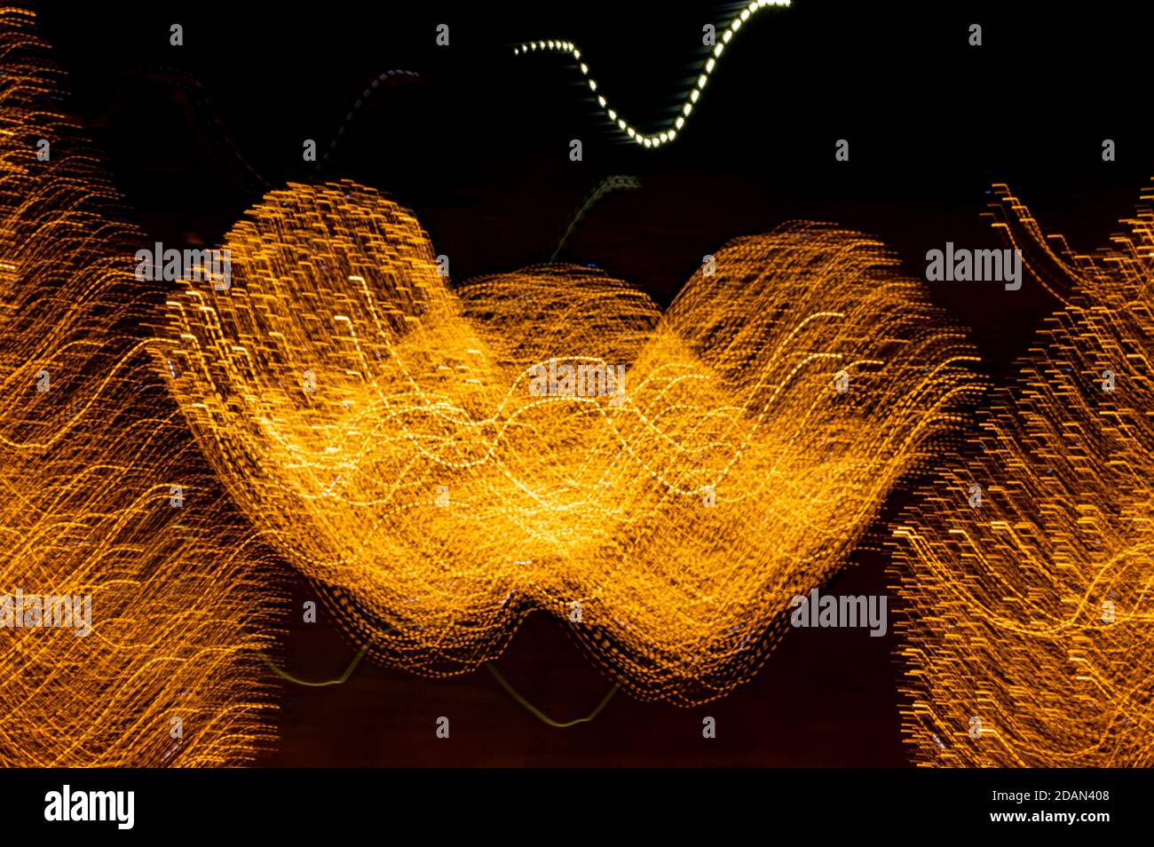 Speed of digital lights in motion. Bright orange neon glowing fast ...