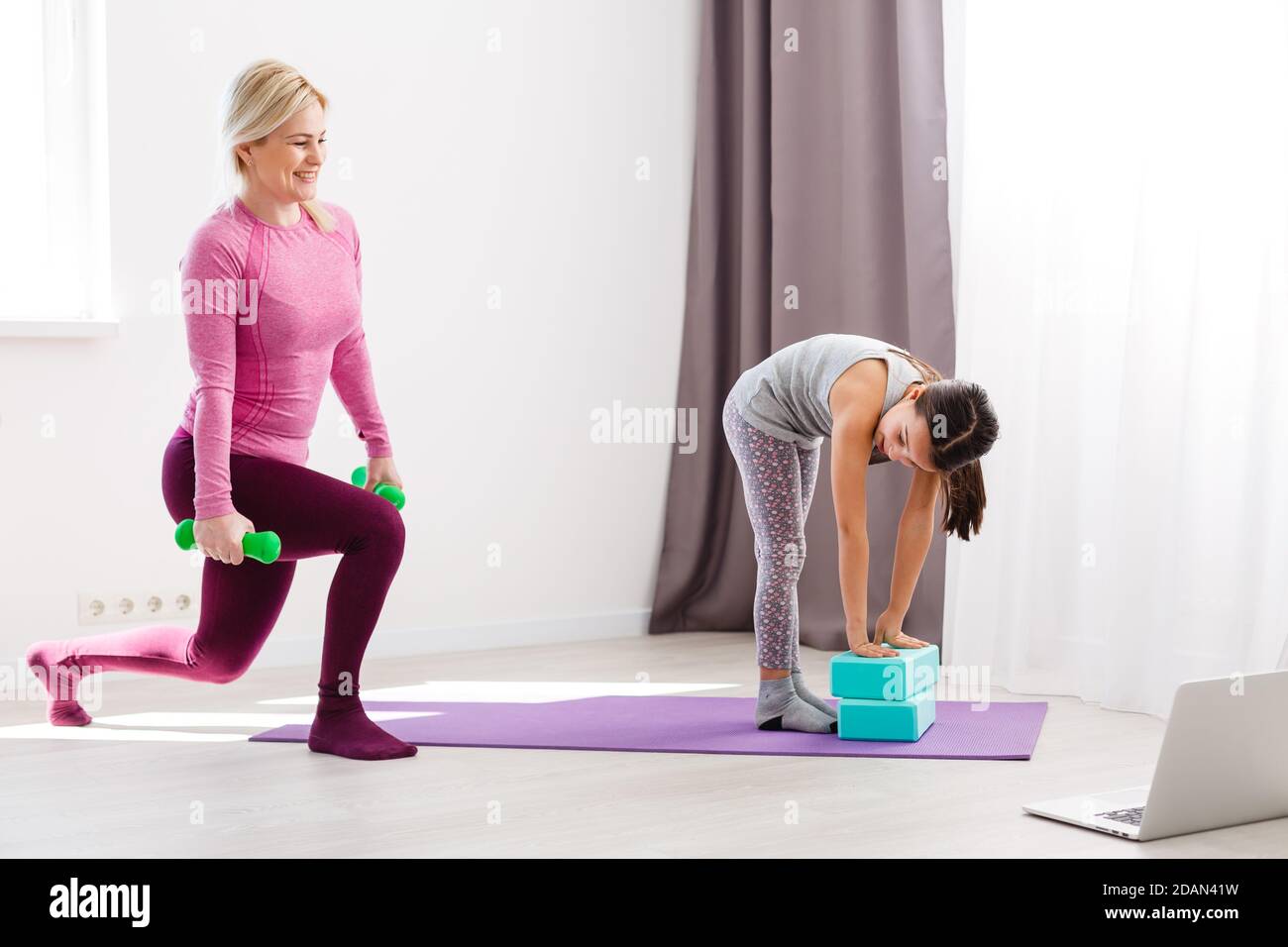 The girl does gymnastics at home. Gymnastics video tutorial. Gymnastic ...