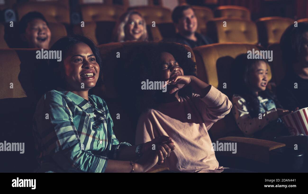 People audience watching movie in the movie theater cinema. Group ...