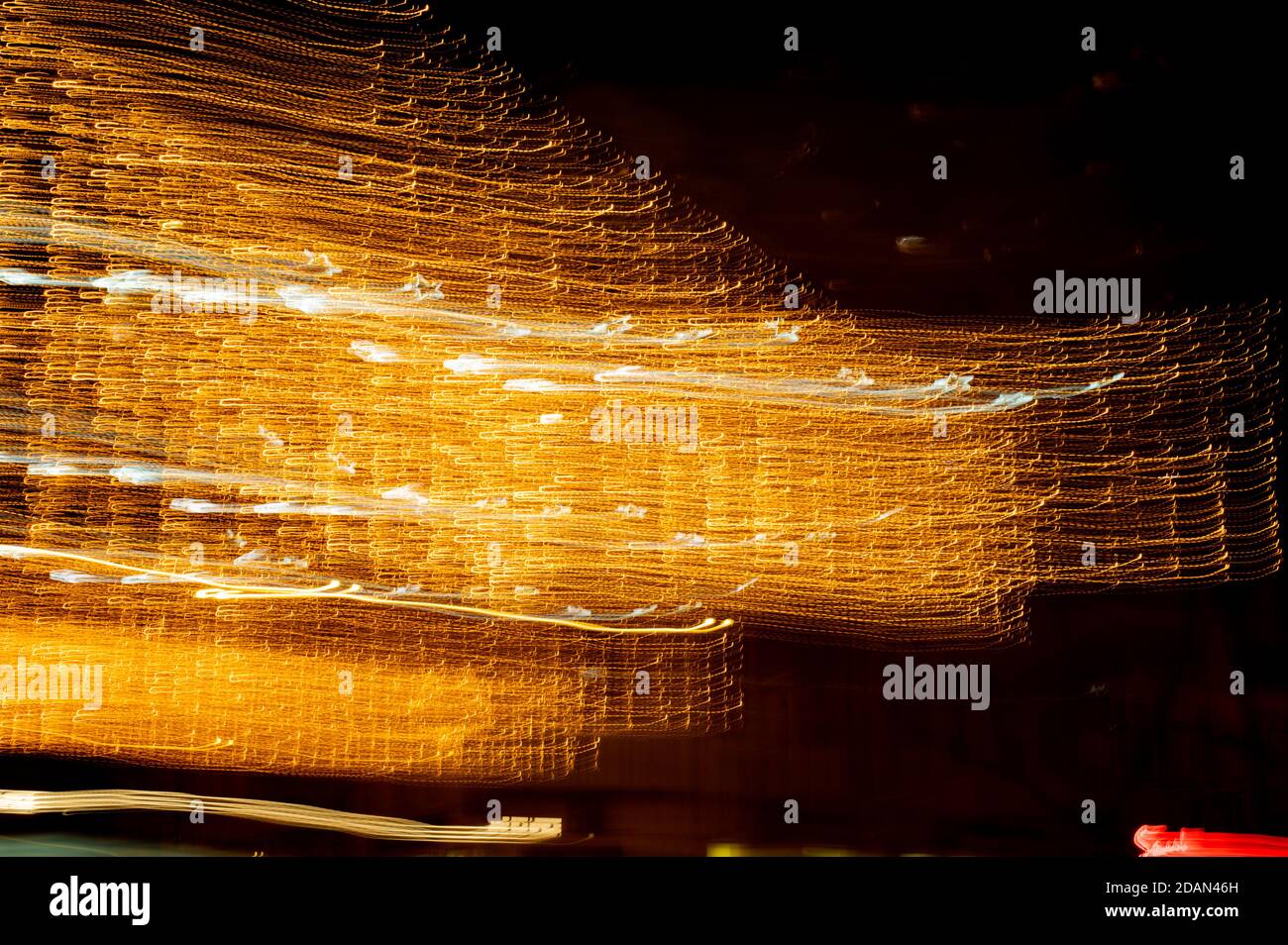 Speed of digital lights in motion. Bright orange neon glowing fast ...