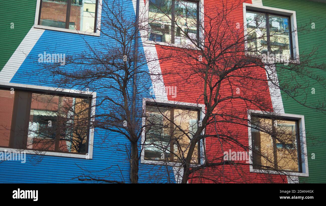 A modern colored exterior school building in Milano Stock Photo - Alamy