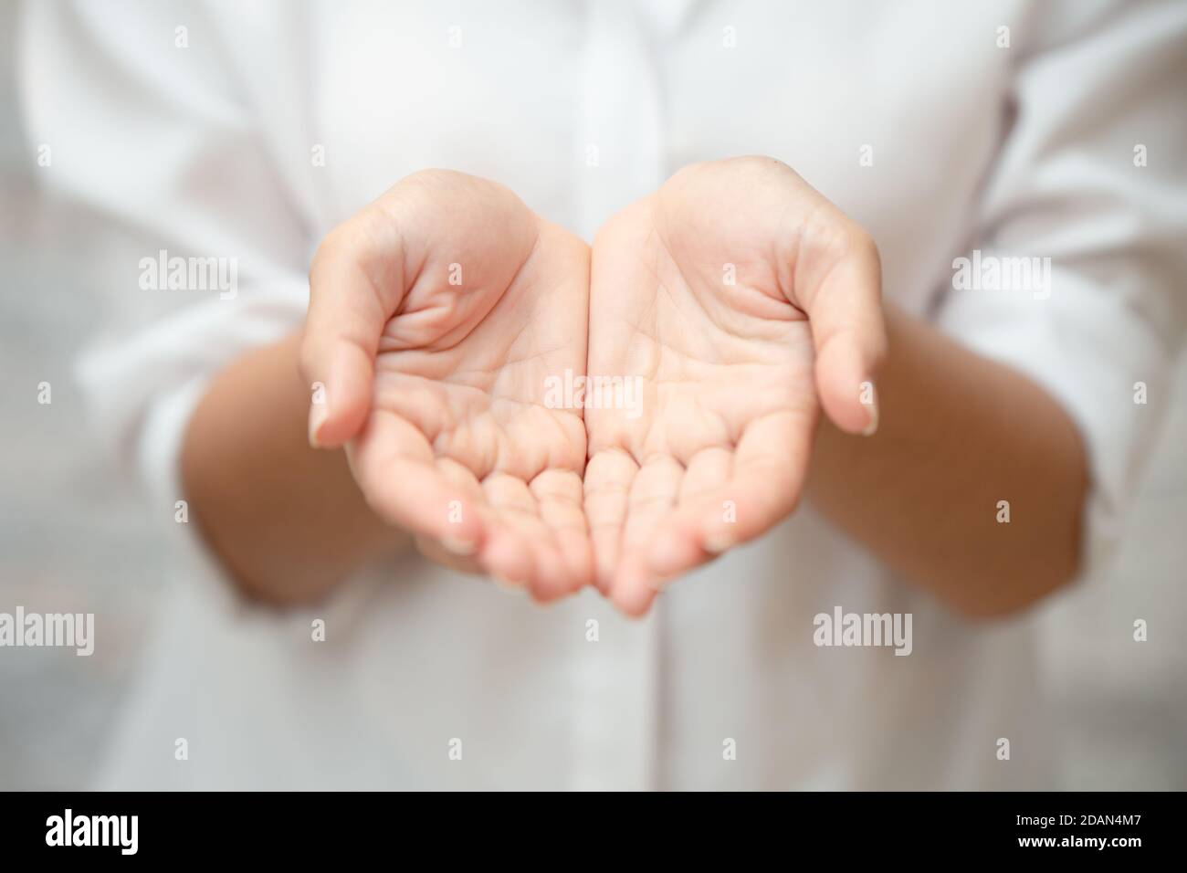 closeup female two hand open palm clean white cloth for giving helping ...