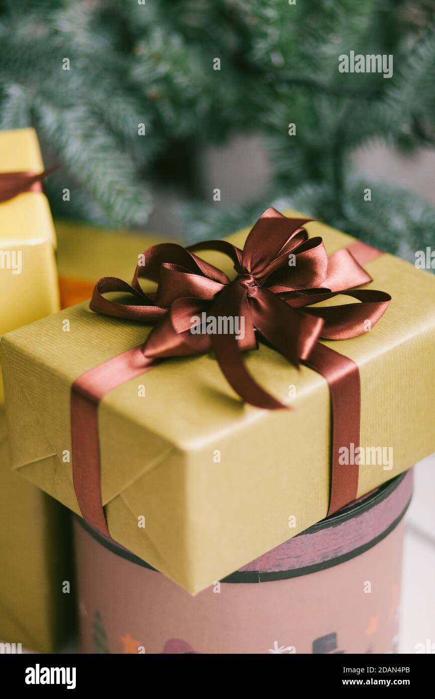 Gift box by christmas tree hi-res stock photography and images - Alamy