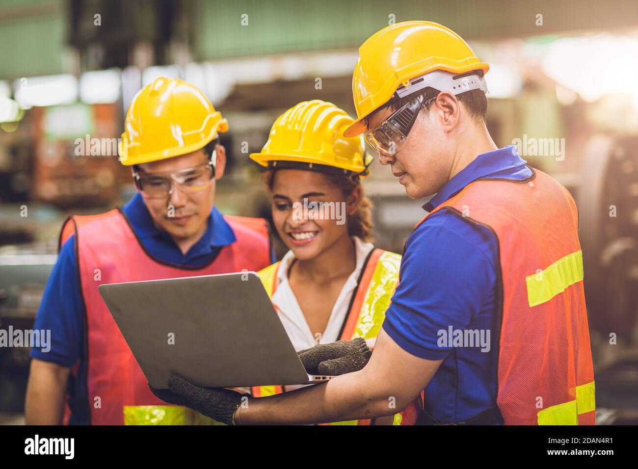 engineer team mix race brainstorming join working together in heavy ...