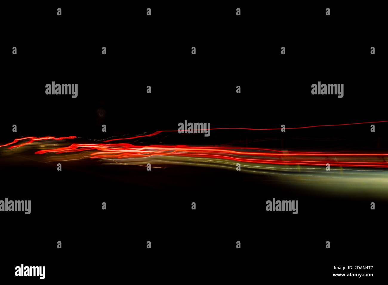 Speed of digital lights in motion. Bright red and white neon glowing ...