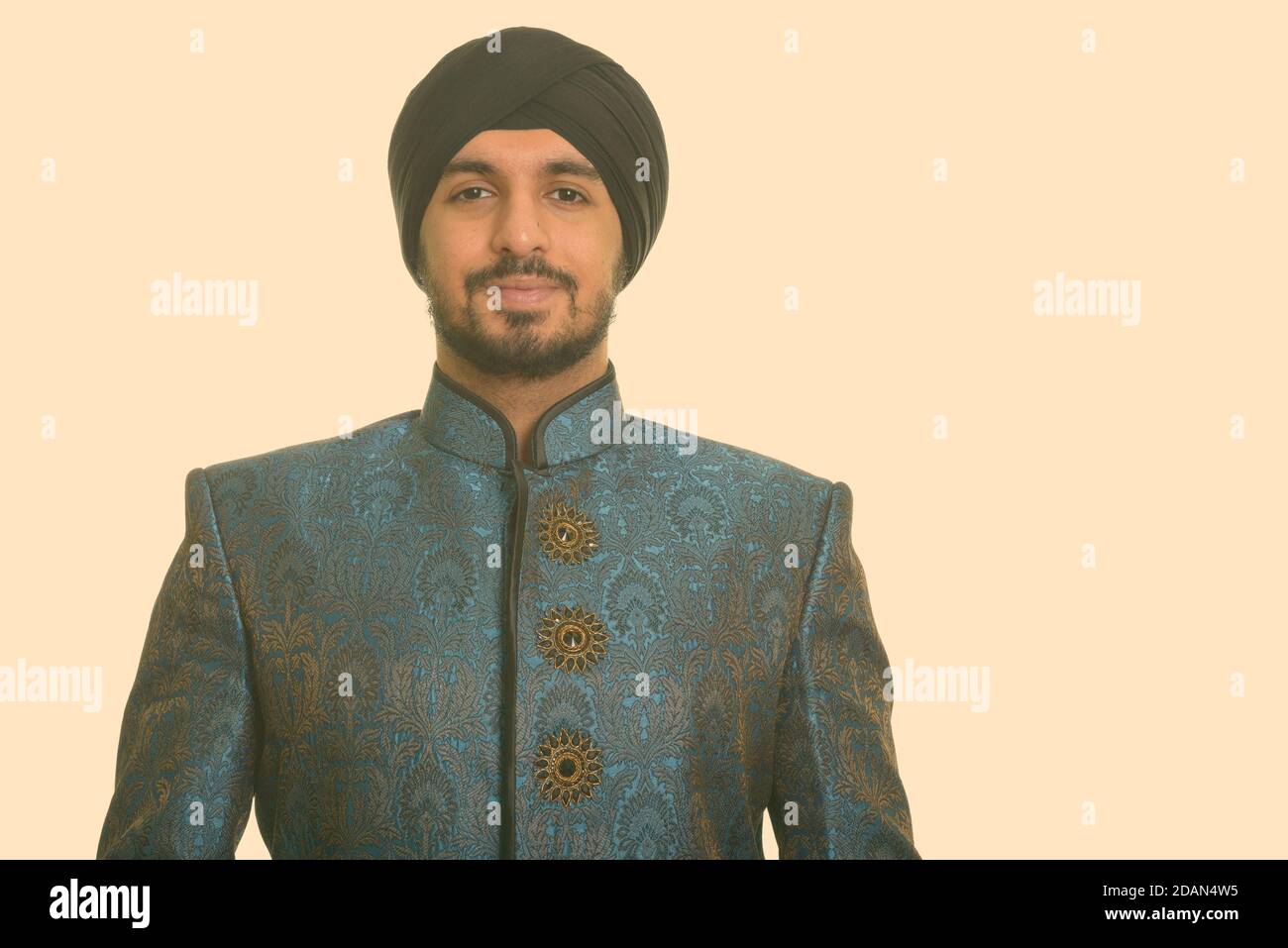 Young handsome Indian Sikh man wearing traditional clothes Stock Photo ...