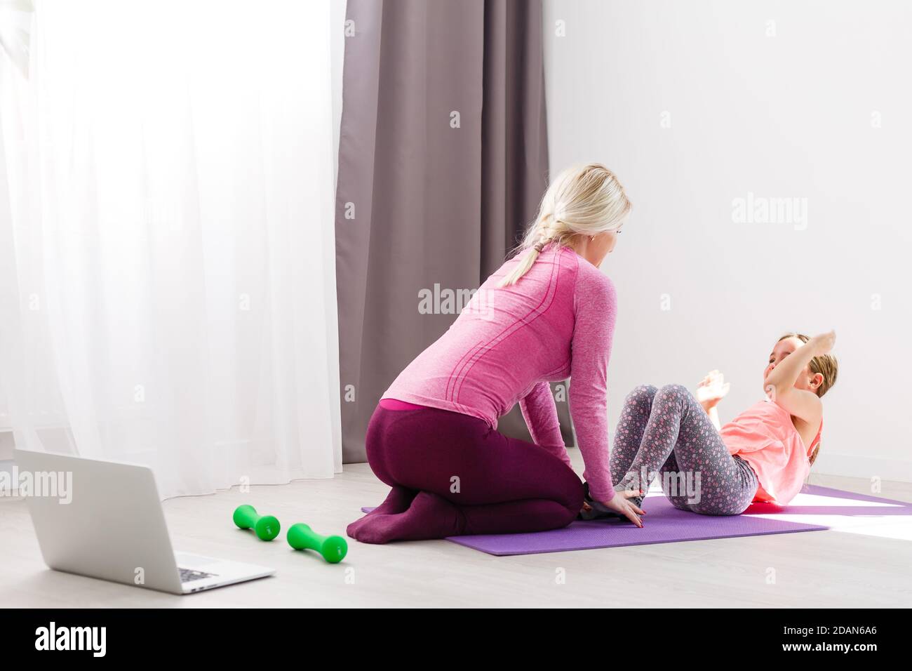 The girl does gymnastics at home. Gymnastics video tutorial. Gymnastic ...