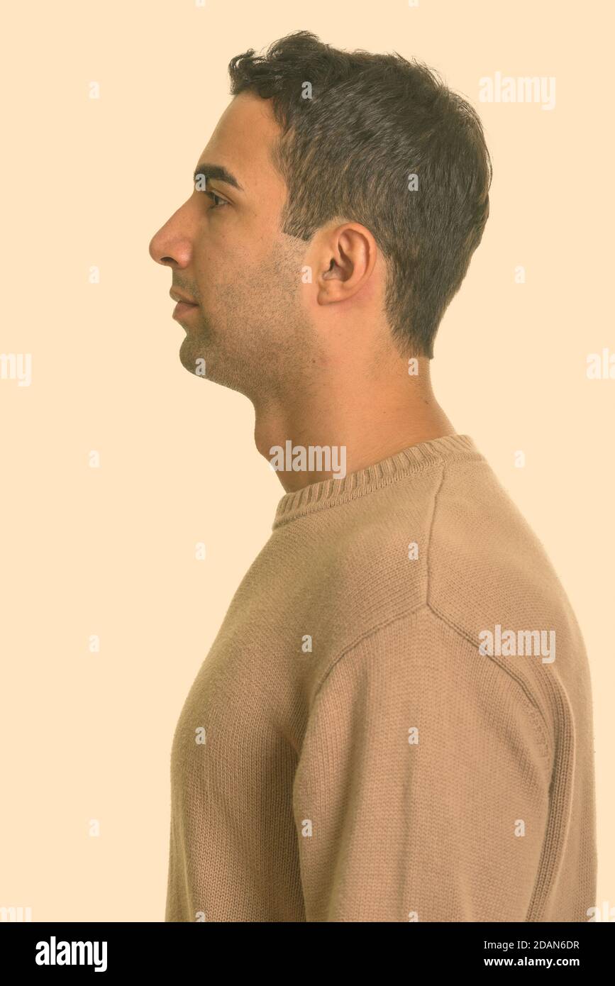 Profile view of young handsome Iranian man Stock Photo - Alamy