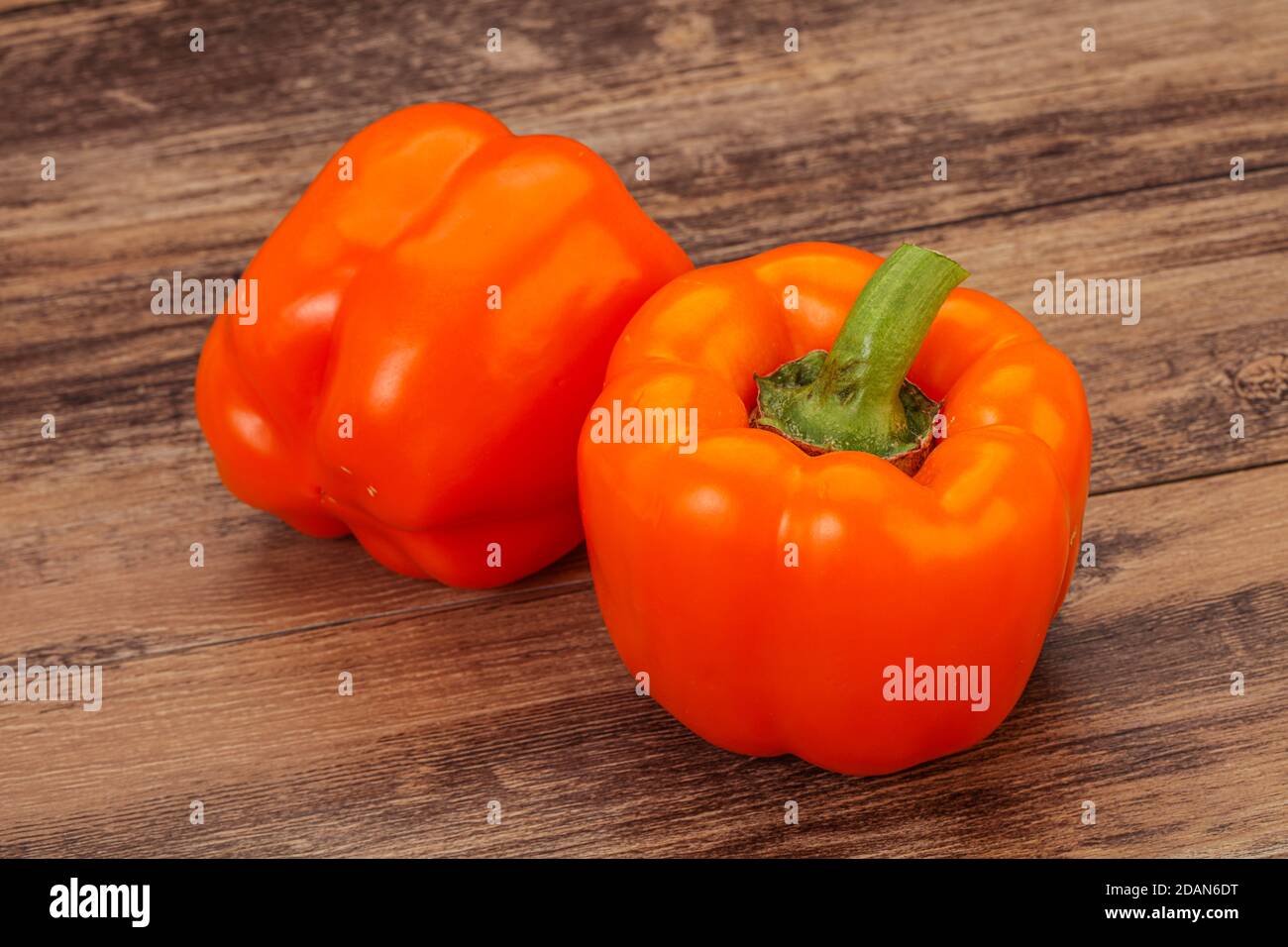Two Orange sweet tasty Bell Pepper Stock Photo - Alamy