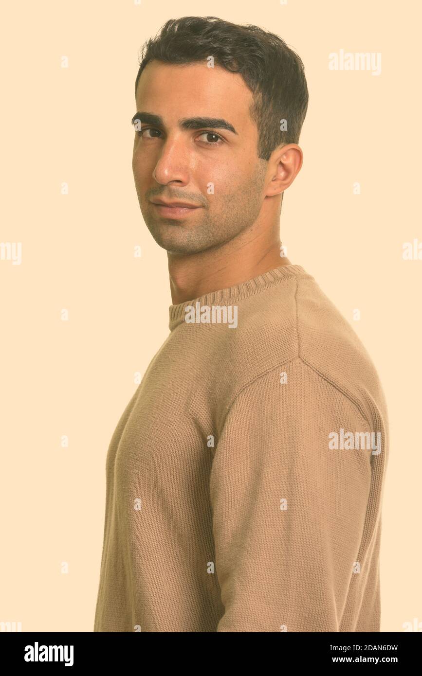 Portrait of young handsome Iranian man looking at camera Stock Photo - Alamy
