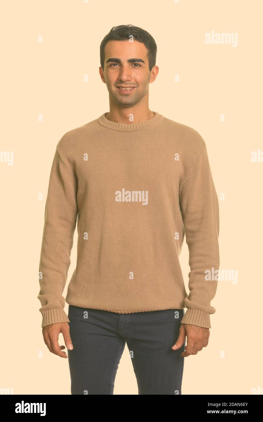 Young happy Iranian man smiling Stock Photo - Alamy