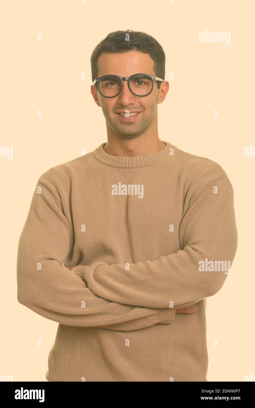 Young happy Iranian man smiling Stock Photo - Alamy