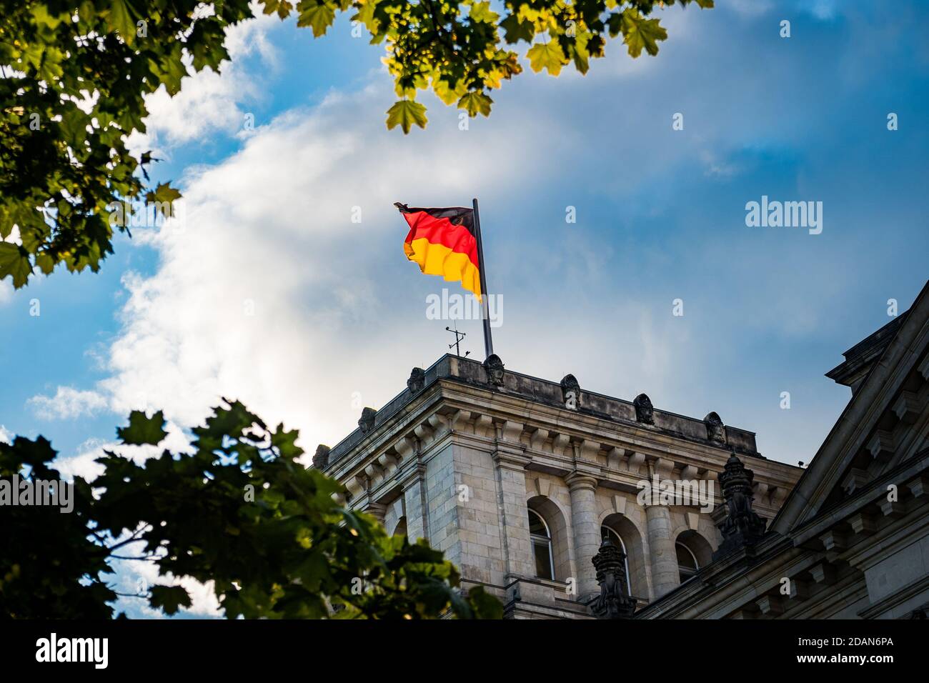German parliament tower with German flag Stock Photo - Alamy