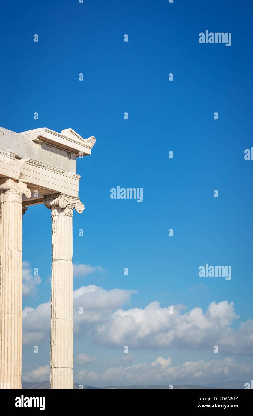 Background with blue sky and ionic column in vertical format Stock ...