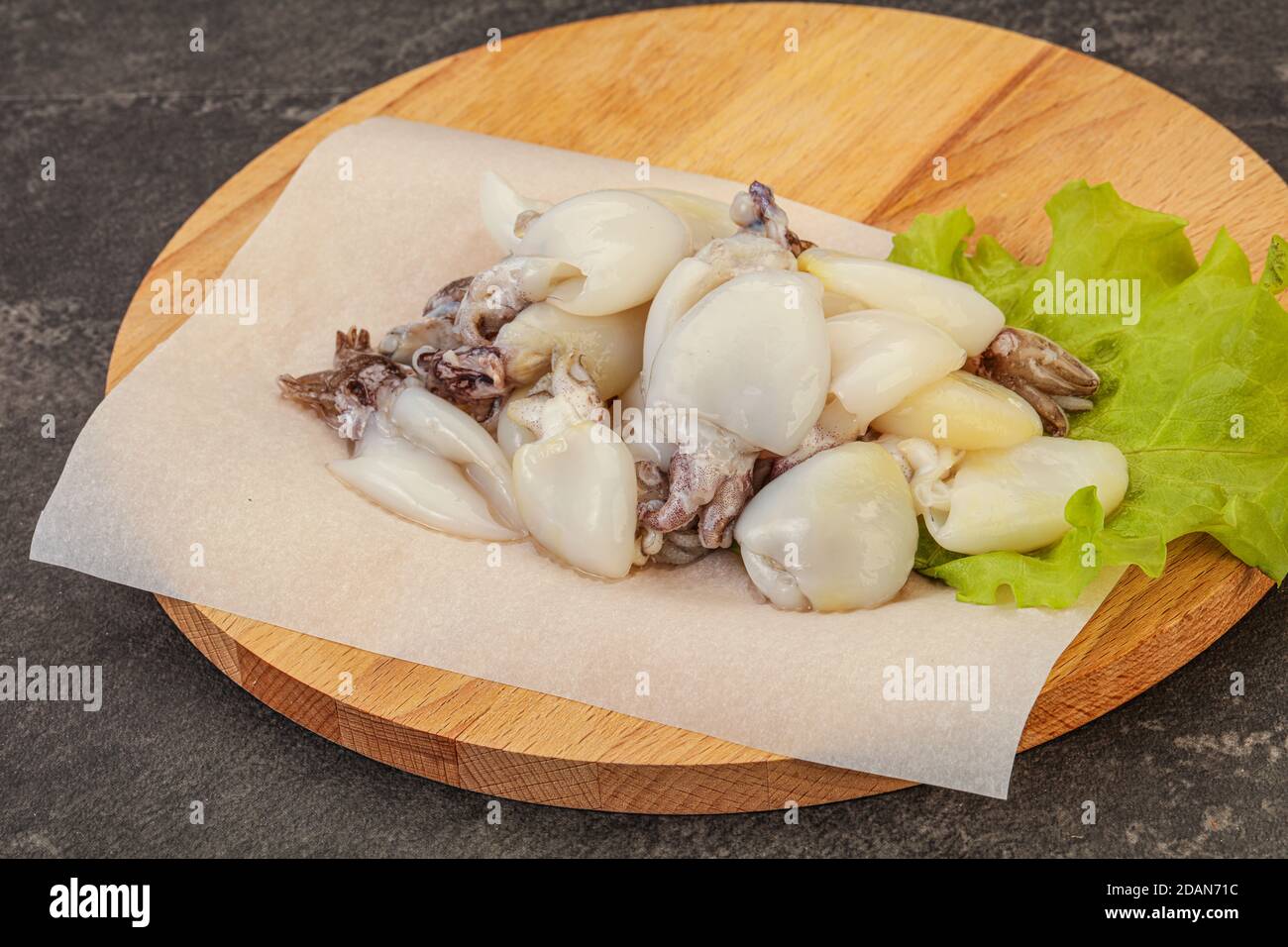 Raw seafood - cuttlefish for cooking over board Stock Photo - Alamy