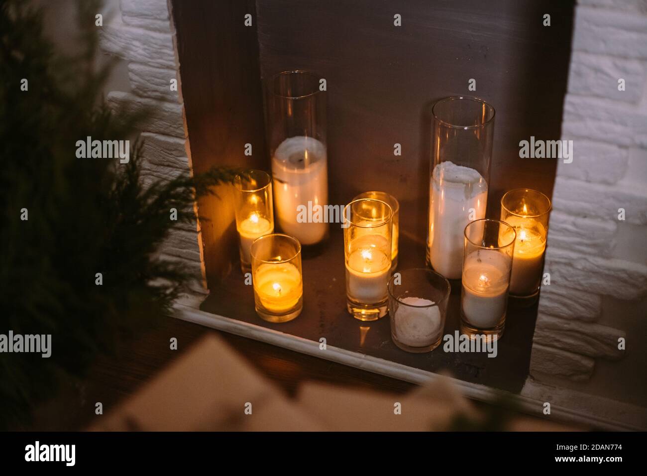 Burning candles in glass. Christmas composition with burning wax ...