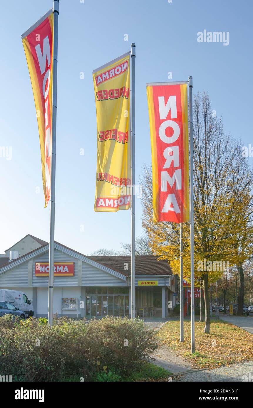 Norma shop in Pankow in golden light Stock Photo - Alamy