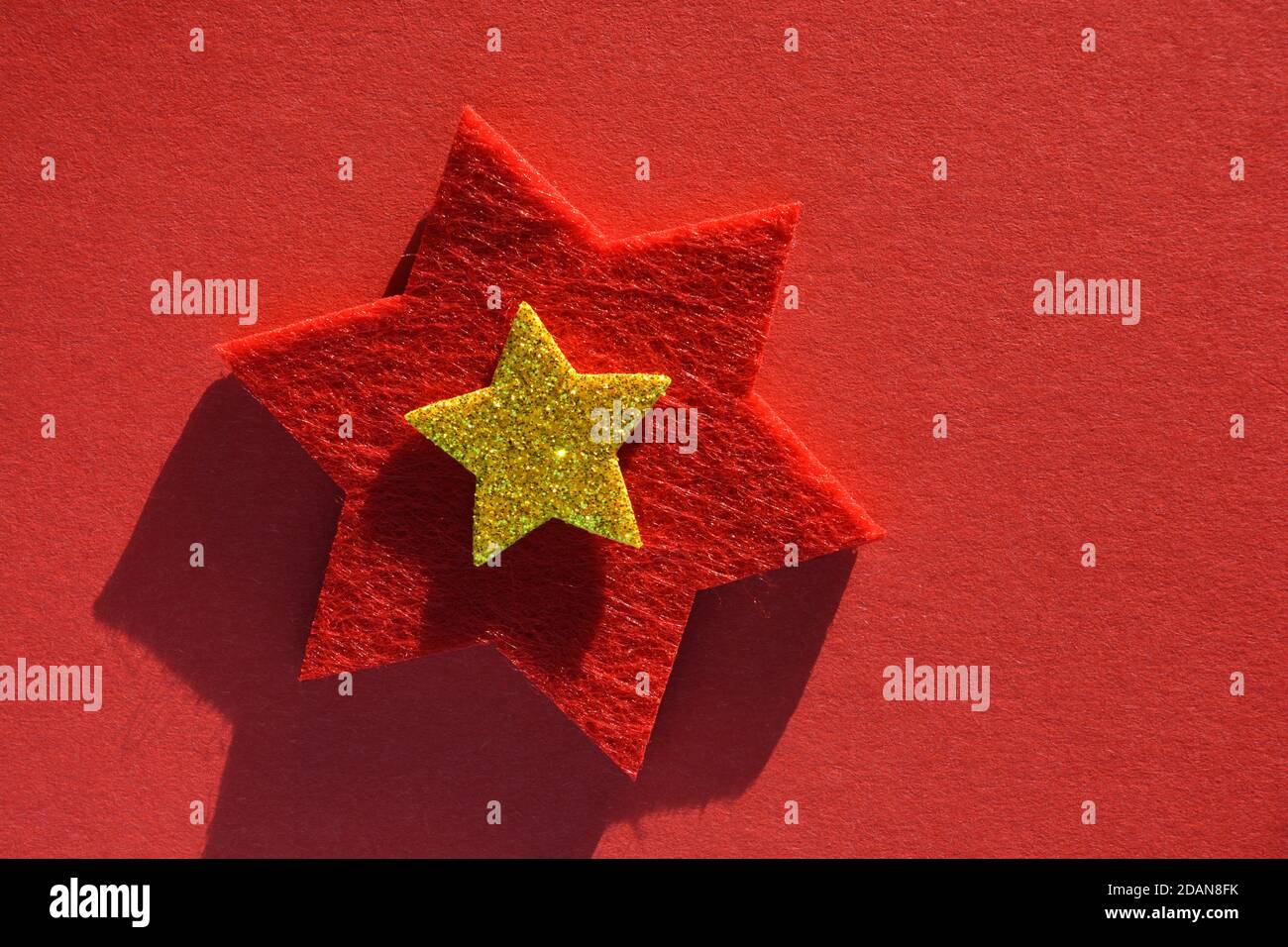 Red and gold stars isolated on red background with copy space Stock ...