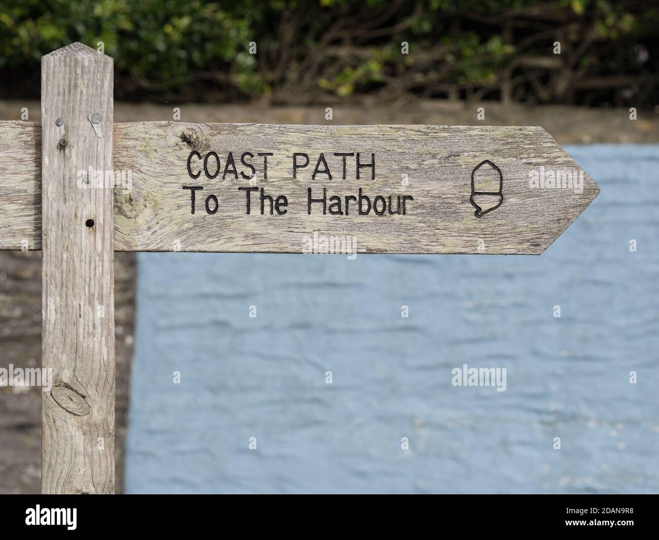 A sign post has 'Coast Path To the Harbour ' written on it.Also visible ...