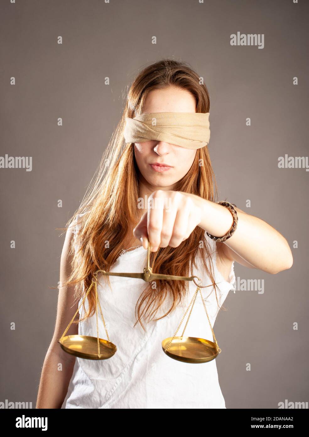 Woman Holding A Scale