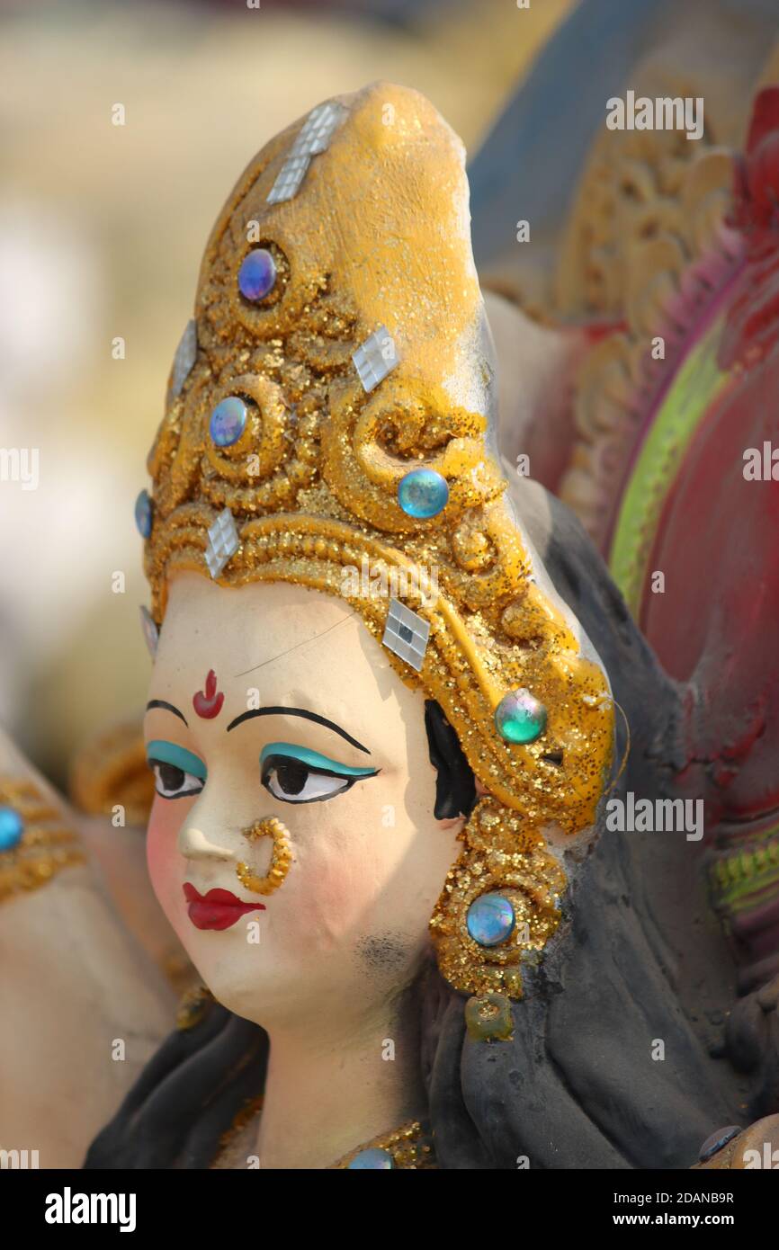 Diya in hands hi-res stock photography and images - Alamy