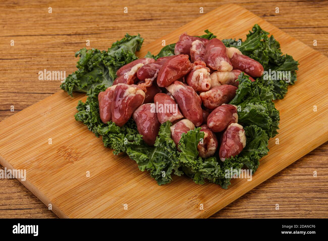 Raw chicken hearts heap for cooking Stock Photo - Alamy
