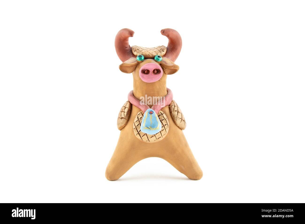 Clay toy, ceramic bull figurine isolated on white background. Folk ...