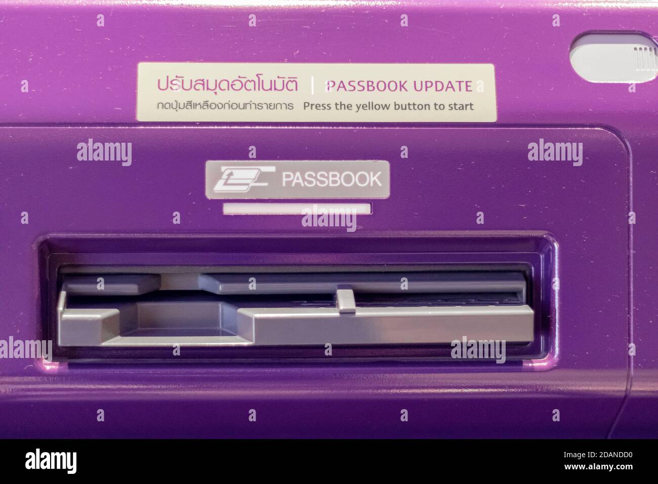 The purple passbook update machine of SCB Bank Stock Photo - Alamy