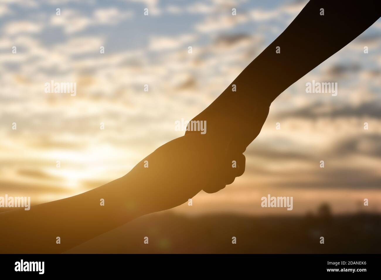 Helping hand sky background hi-res stock photography and images - Alamy