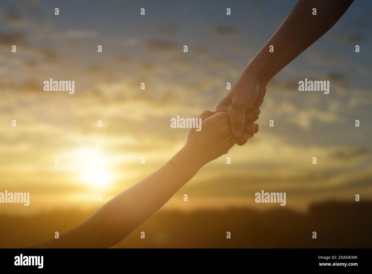 Helping hand sky background hi-res stock photography and images - Alamy