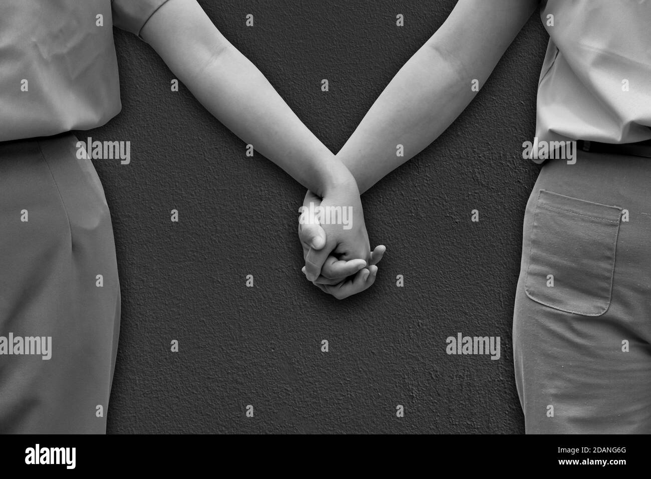 Two female holding hands together in black and white colors photo Stock ...