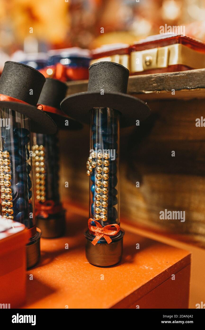 View shot of candy tube container in e circus-themed dessert table for ...