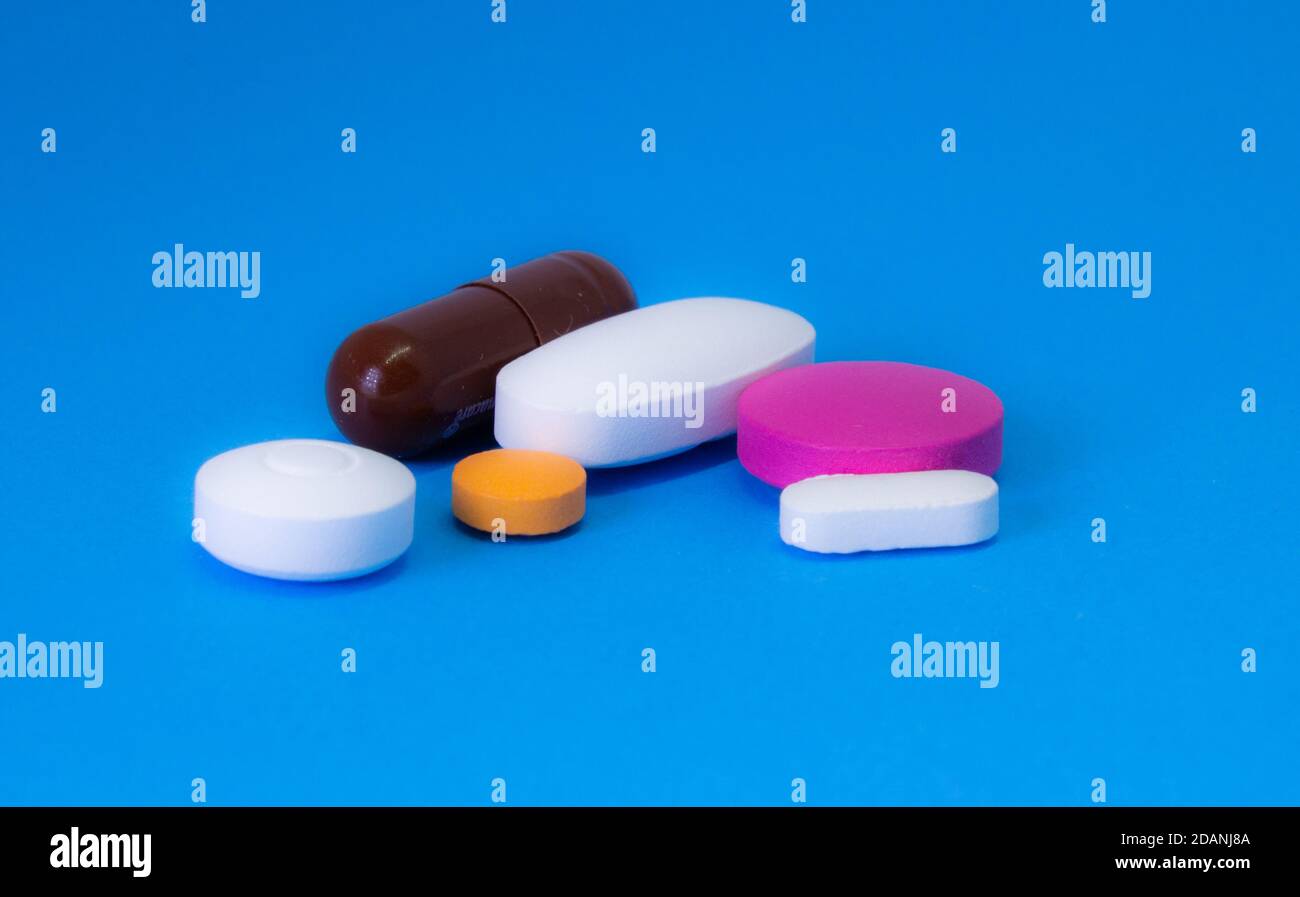 Pharmacy and Hospital theme. mix of pills and capsules with ...