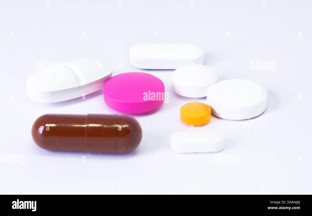 Pharmacy and Hospital theme. mix of pills and capsules with ...