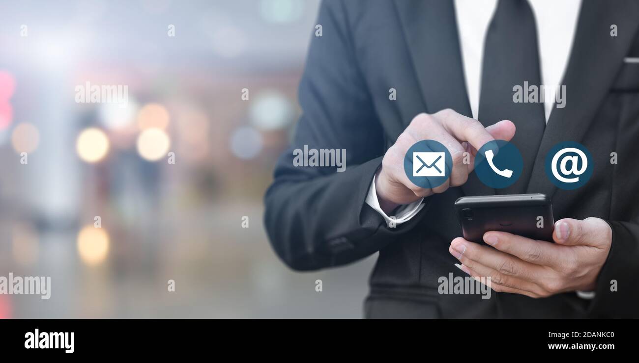 Businessman using mobile smartphone. Concept of Contact Us, customer ...