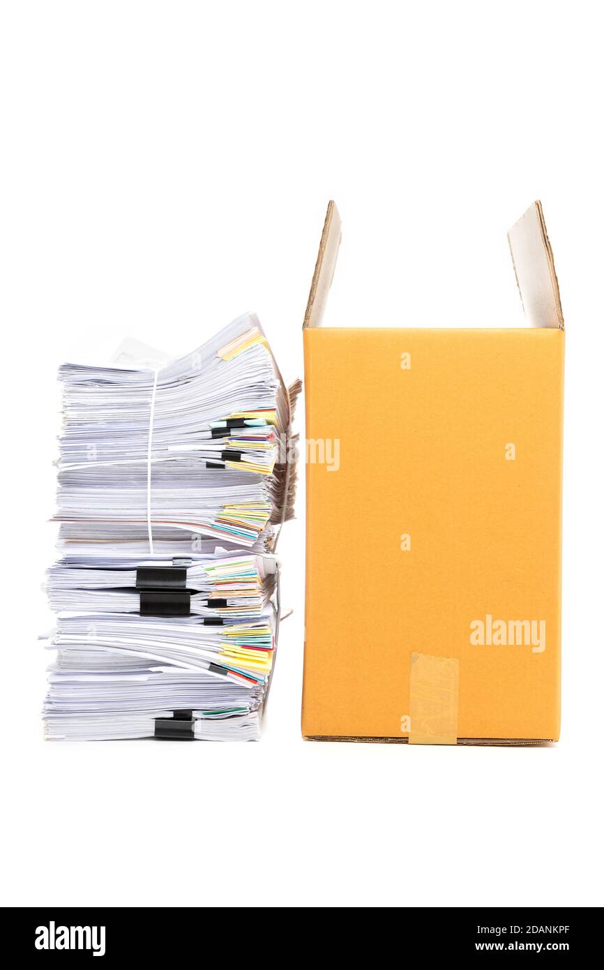 Stack of Documents and corrugated cardboard box isolated on white ...