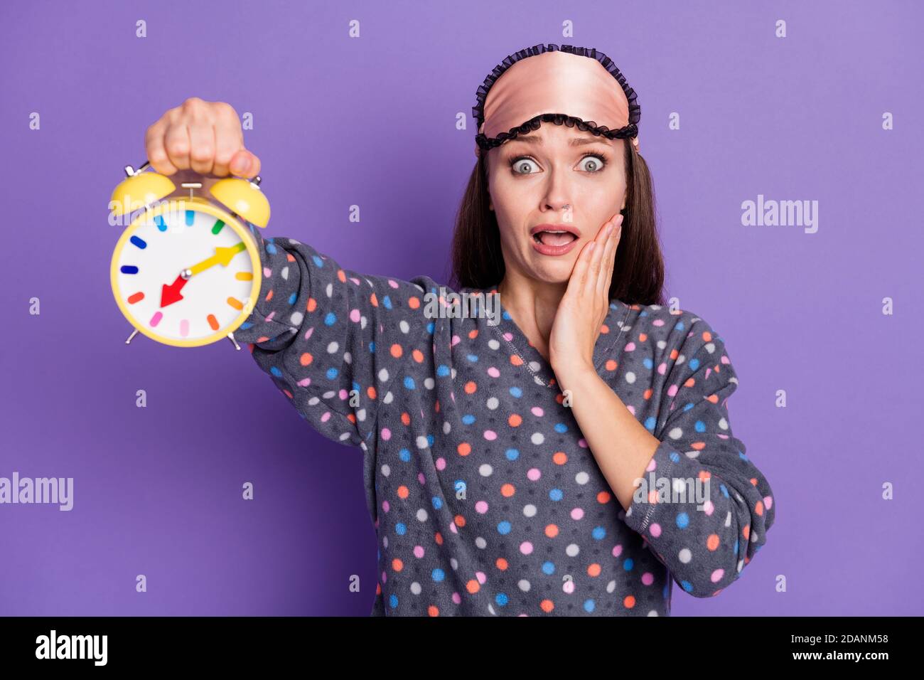 Photo of panic worried crazy girl impressed missed time hold clock ...
