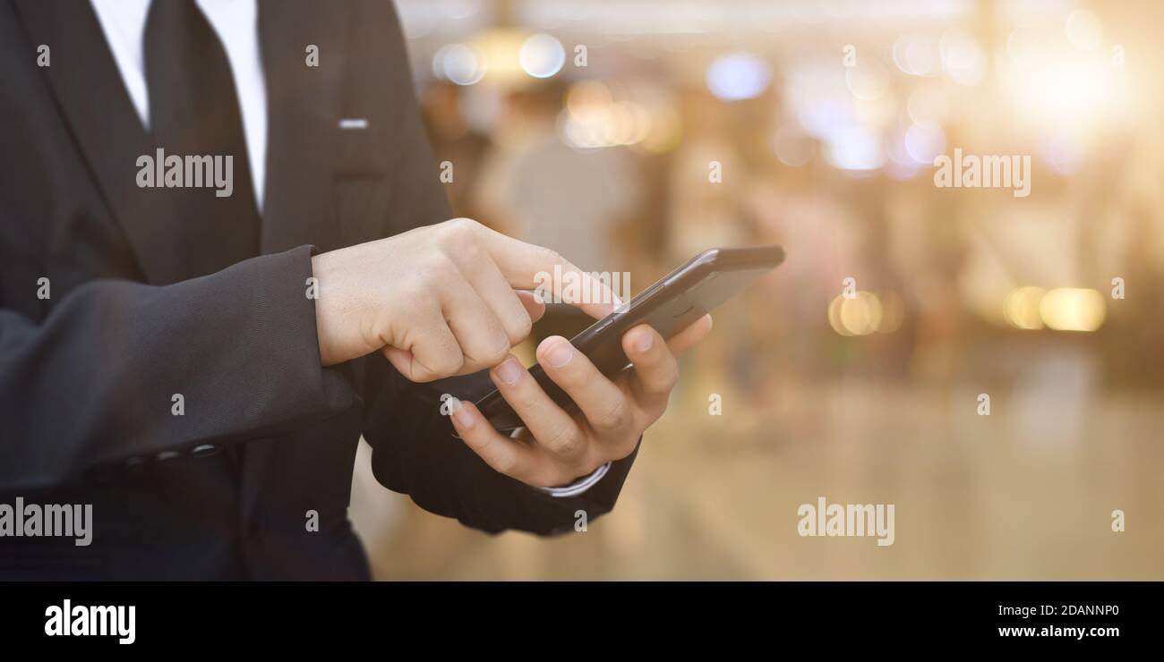Businessman sms texting using social hi-res stock photography and ...