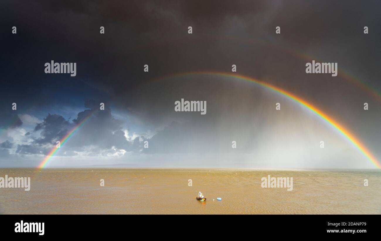 Double rainbow over the river Dee estuary on the North Wales coast ...