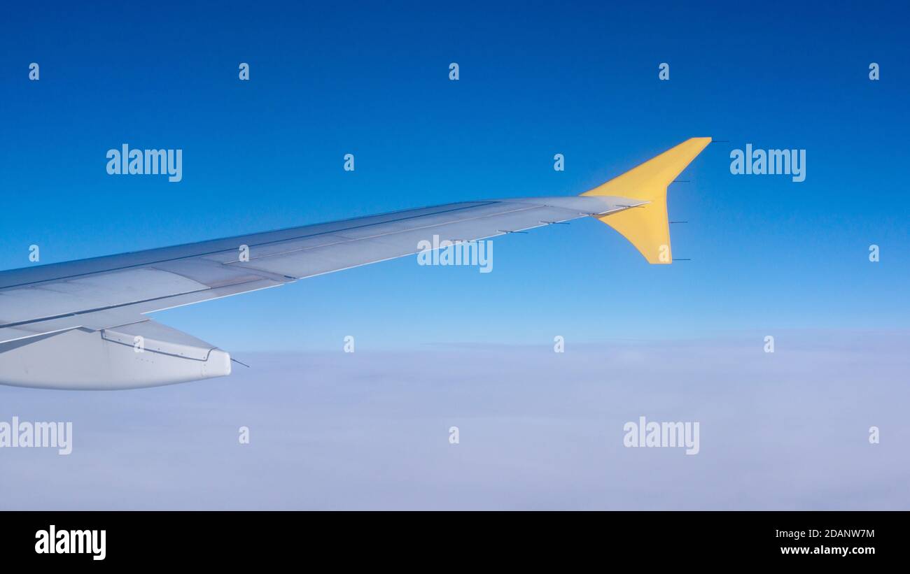right wing of airplane in the sky Stock Photo - Alamy