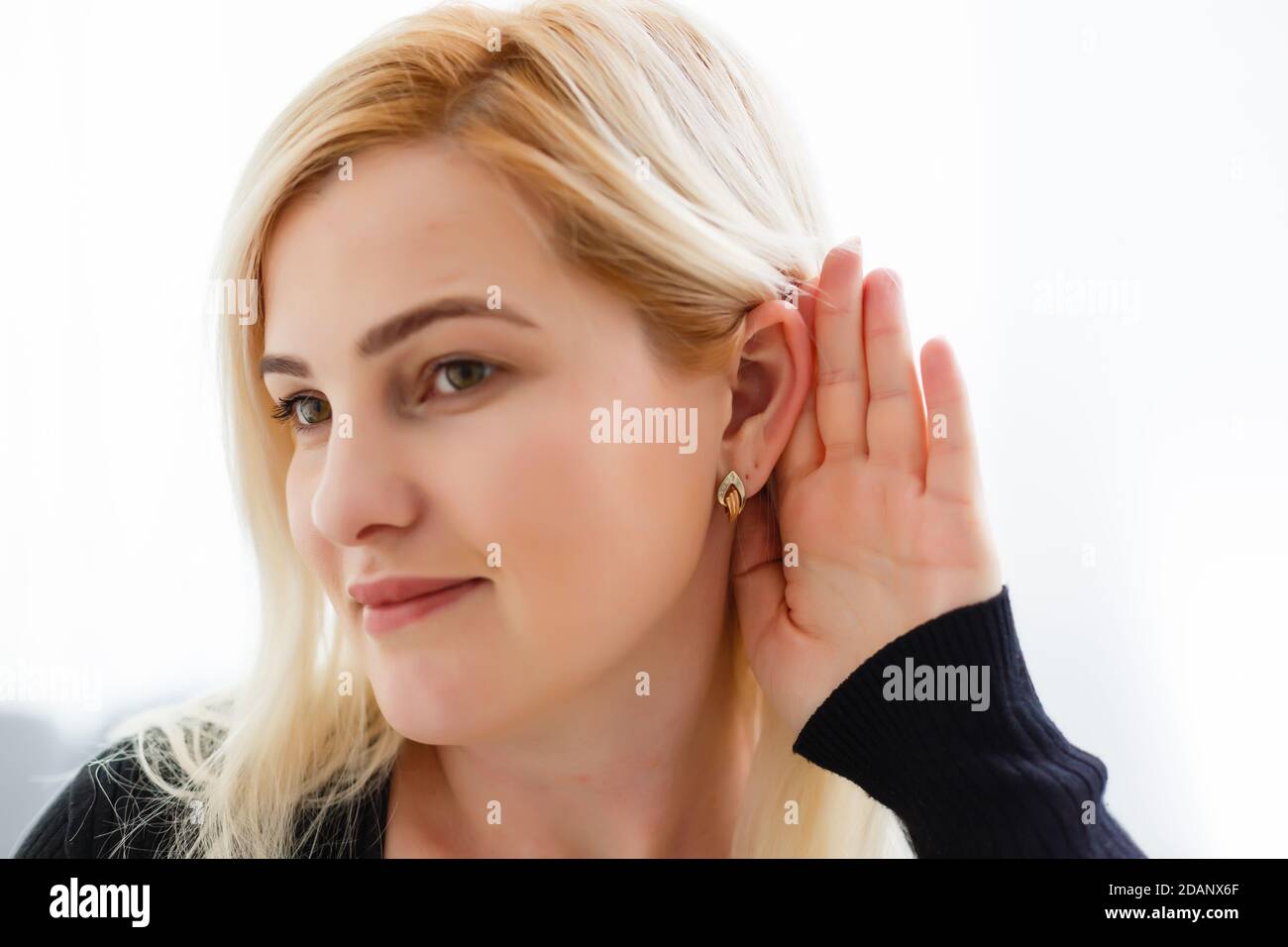 Girl overhearing hi-res stock photography and images - Alamy