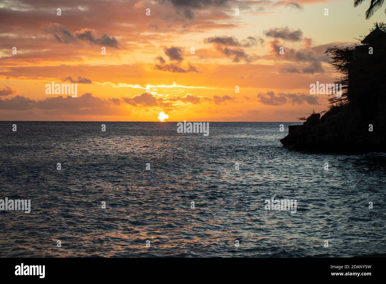 Beautiful Sunset on Curacao caribbean sea Stock Photo - Alamy